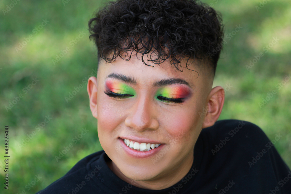 LGBT Gay model rainbow makeup smiling Stock Photo | Adobe Stock