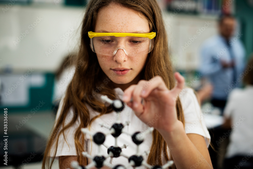 Girl student learning science Stock Photo | Adobe Stock