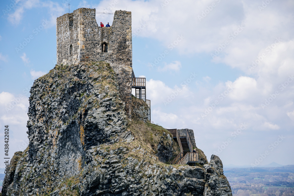 Medieval gothic castle Trosky at two basalt volcanic plugs, tower on ...
