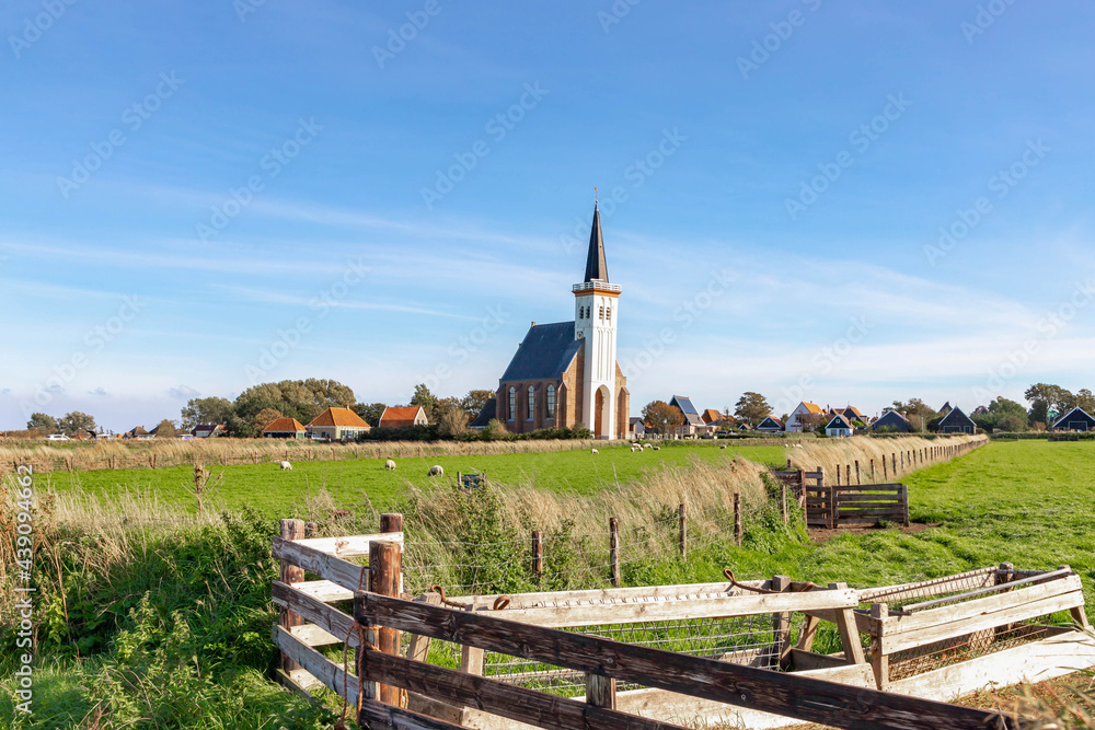 Typical landscape of Texel island with small village and picturesque ...