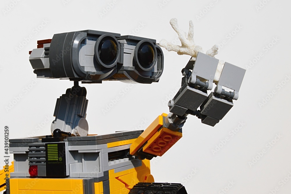 LEGO figure of Wall-E robot from Disney Pixar movie examining white sea ...