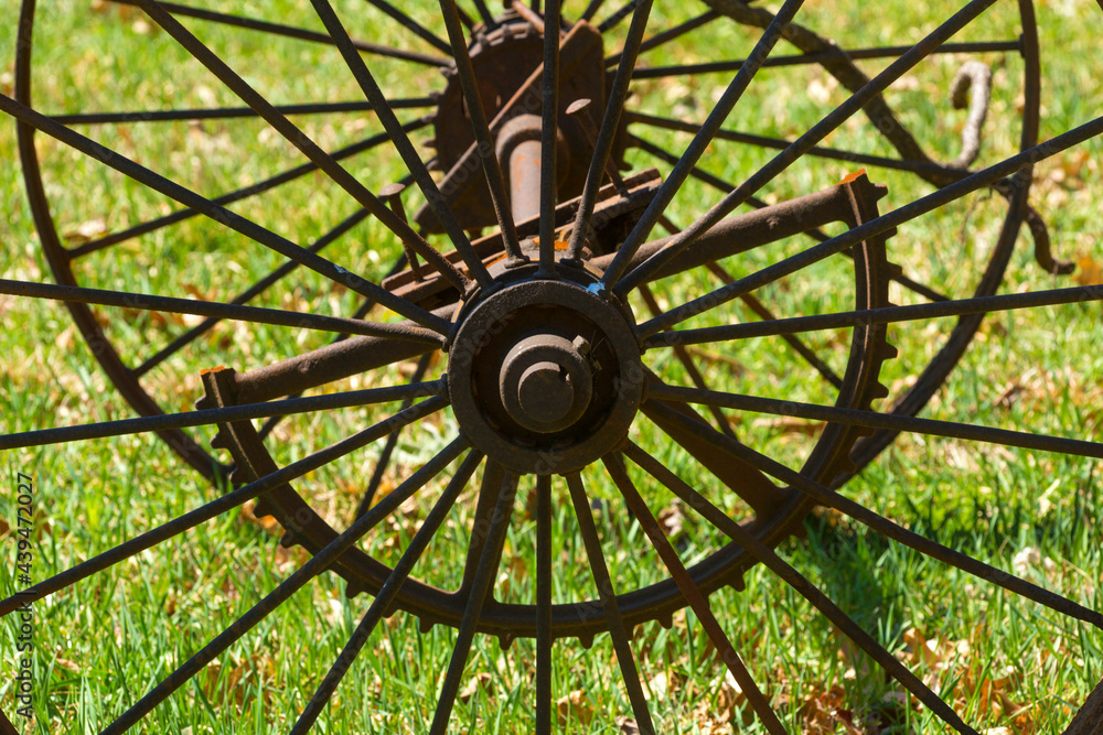 Rusty iron wheels in field at Whitaker Woods in Connecticut. Stock ...