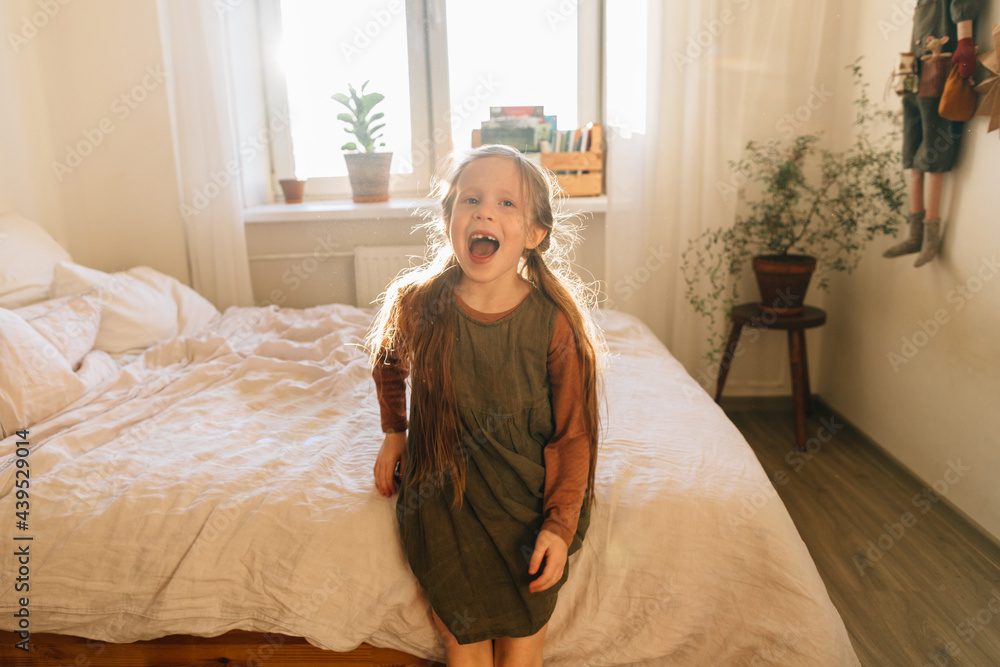 Excited little girl Stock Photo | Adobe Stock