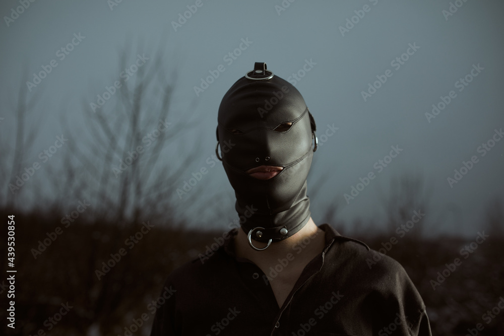 Male Slave In Public Wearing A Mask Stock Photo Adobe Stock