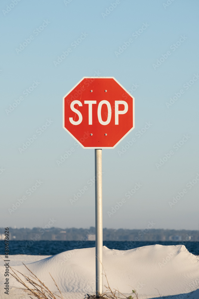 Red Stop Sign at the Beach Stock Photo | Adobe Stock