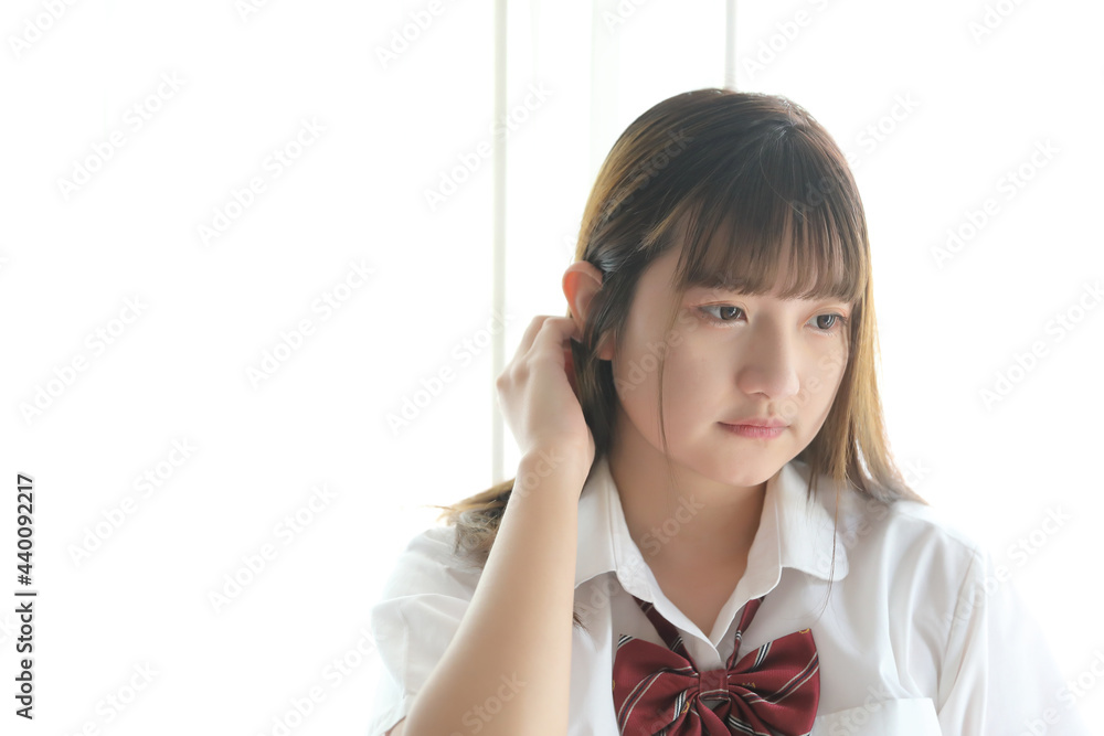 Portrait japanese school girl uniform in white tone bed room Stock ...