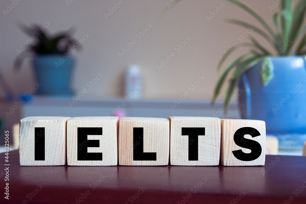 IELTS - words from wooden blocks with letters, International English ...