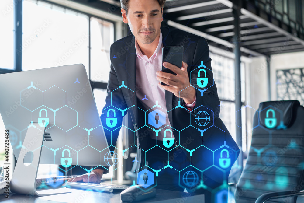 Businessman in suit checking cyber security using smart phone to ...