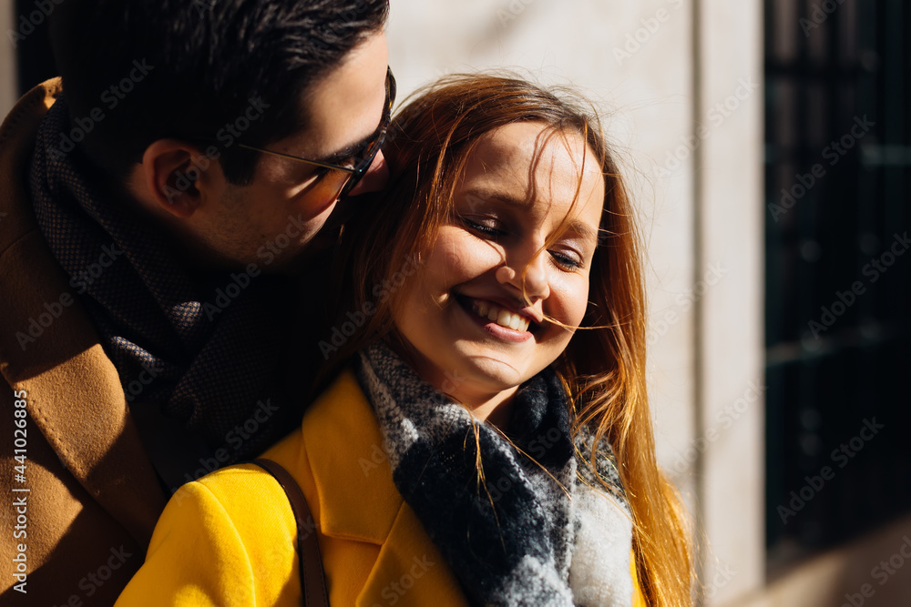 affectionate couple on a walk around the city. Business man in ...