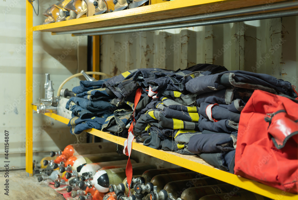 Firefighter or fireman safety protection tools, extinguisher, uniform ...