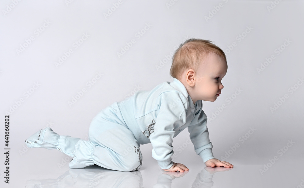 Active creeping child with concentrated reproduction of the face. Small ...