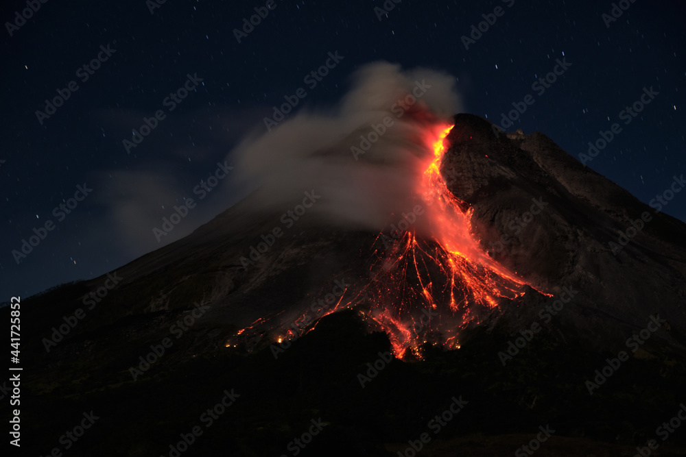 Mount Merapi erupts with high intensity at night during a full moon ...