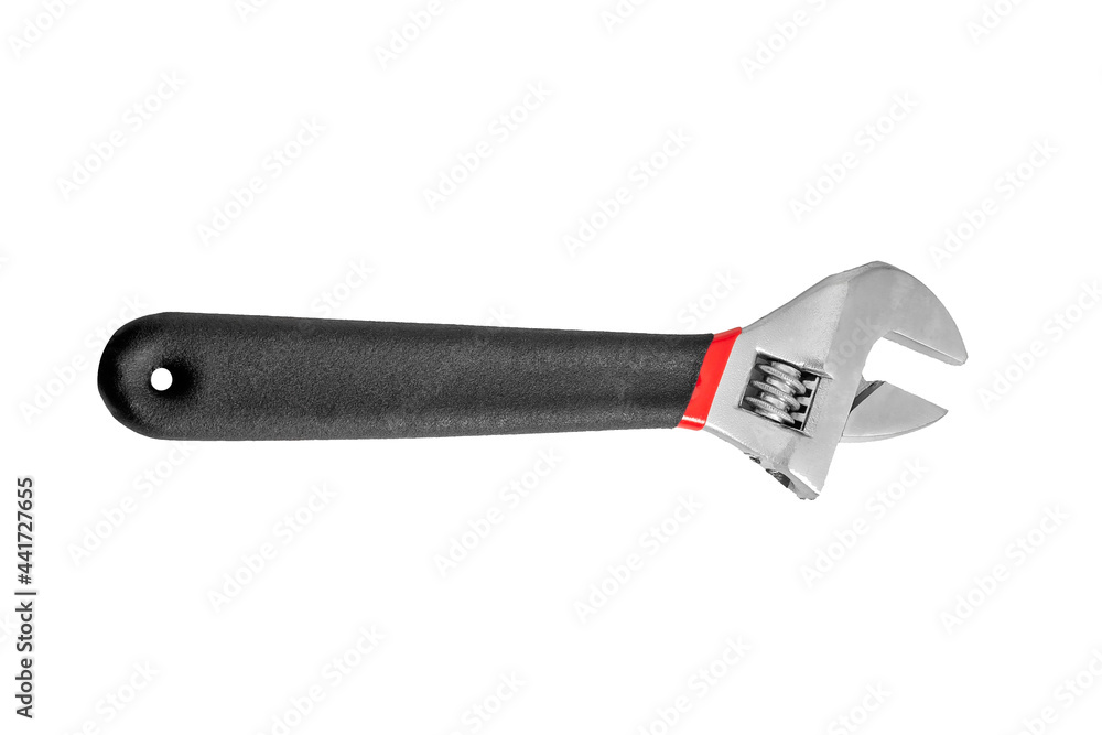 Small adjustable wrench with black handle. Hand tool. Close-up ...
