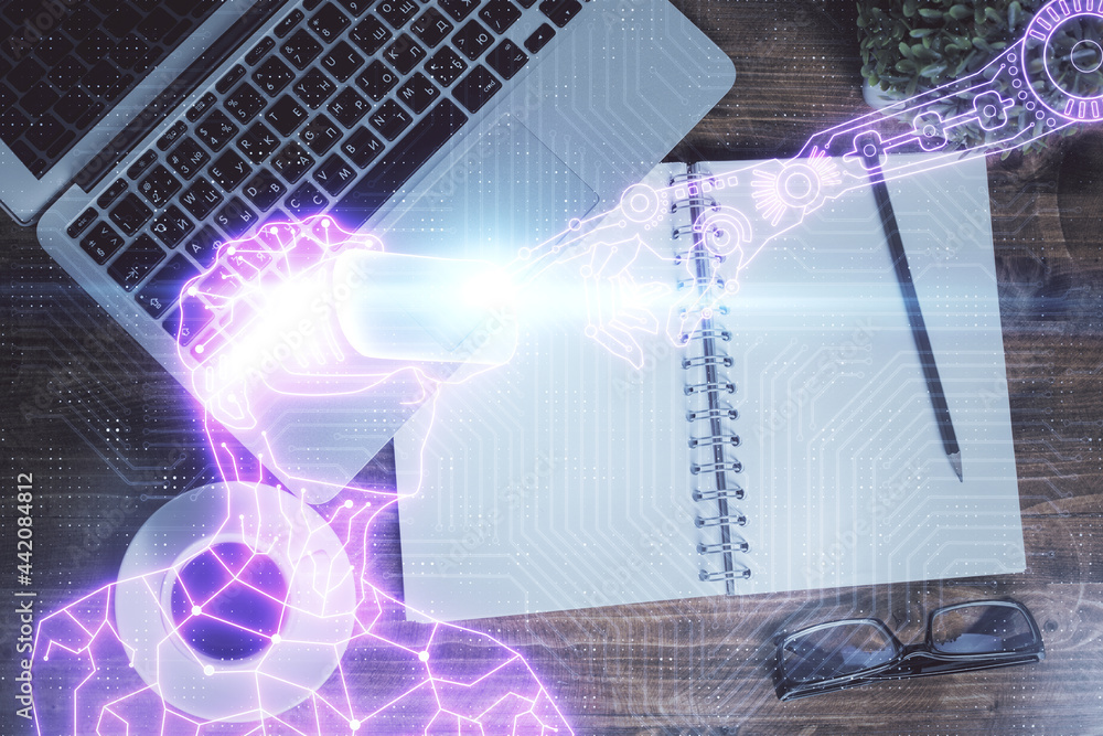 AR hologram drawings over computer on the desktop background. Top view ...