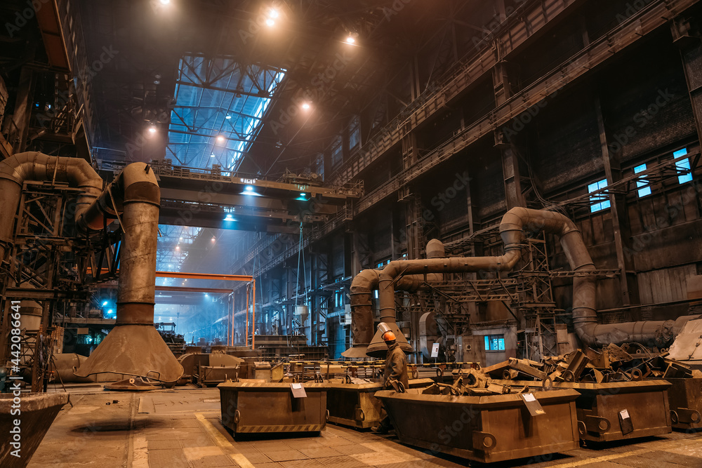 Large hangar or warehouse of Metallurgical Plant, dark industrial ...