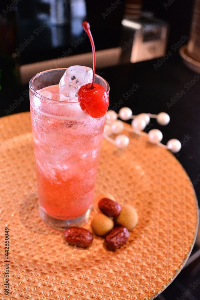 chilled cocktail pink glass alcohol sakura flower drink with cherry ...