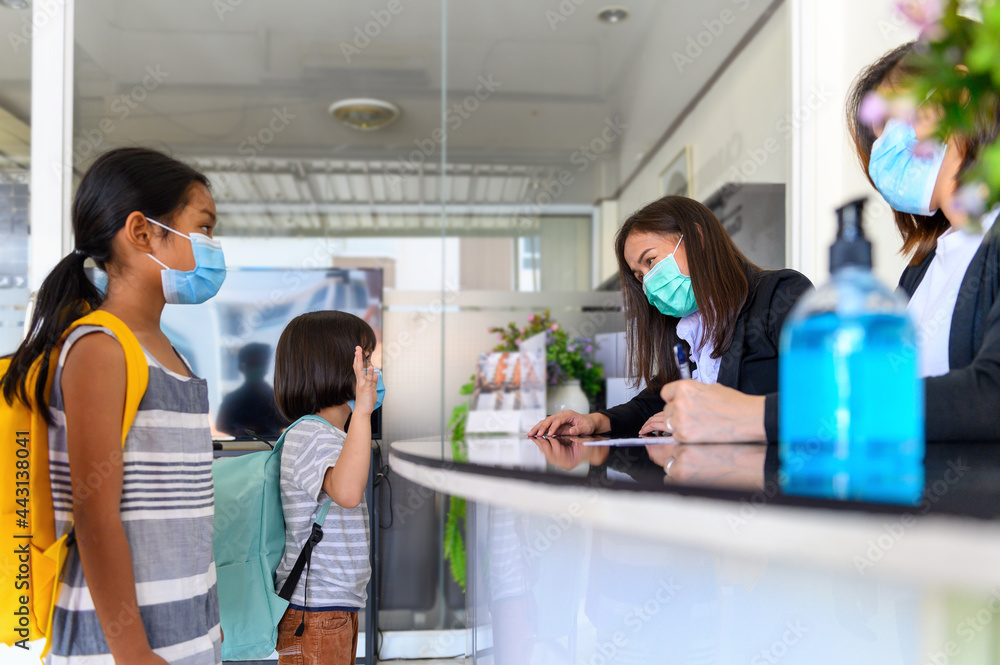 Kindergarten student girl raising her hand and personal information ...