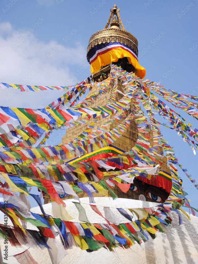 Colorful prayer flags flutter at Boudhanath in Kathmandu, Nepal. This ...