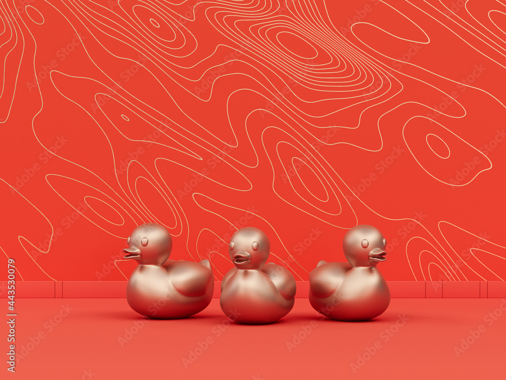 monochrome single metallic gold color rubber ducky in orange background ...