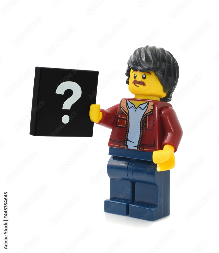 Lego minifigure of man with black plate of question-mark. Editorial ...