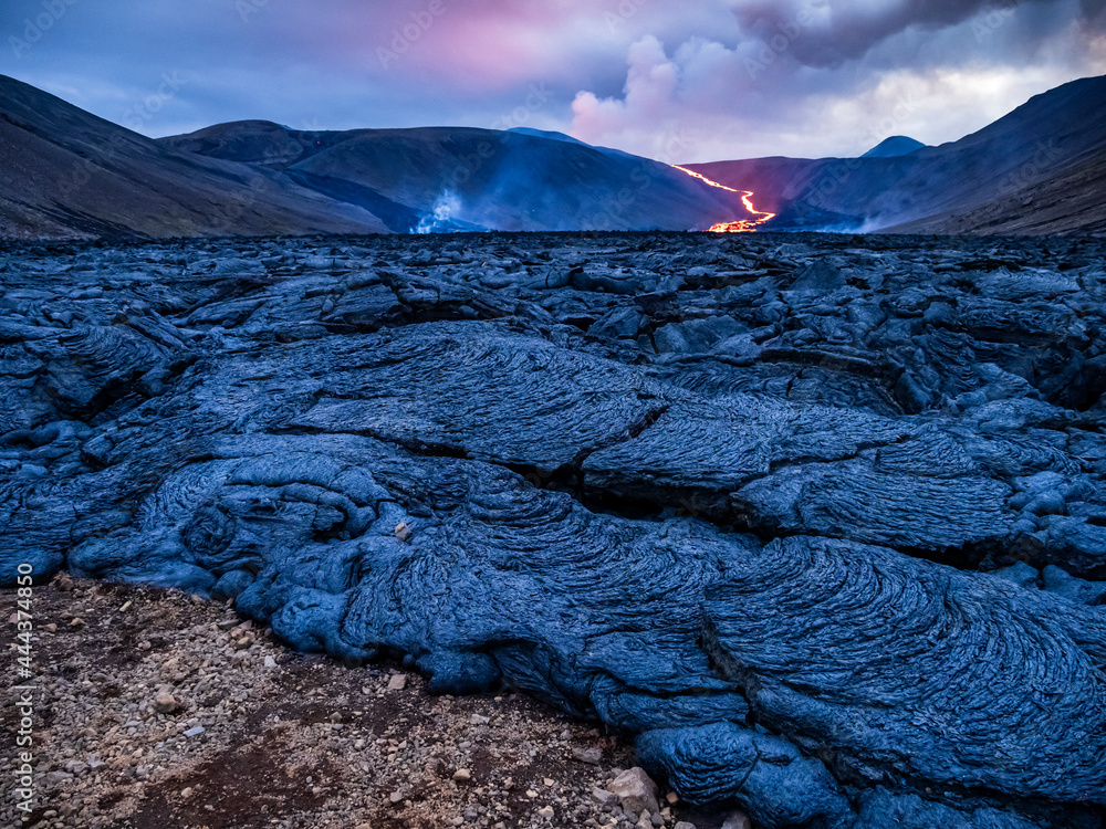 Lava spreads across the landscape around Fagradalsfjall volcano ...