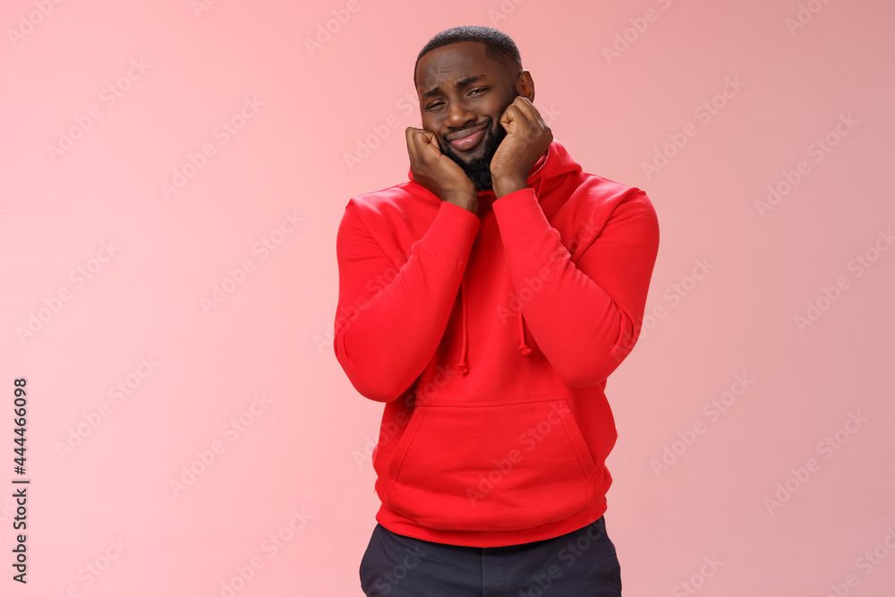 Guy heart melting from cuteness and lovely scene, folding lips silly ...