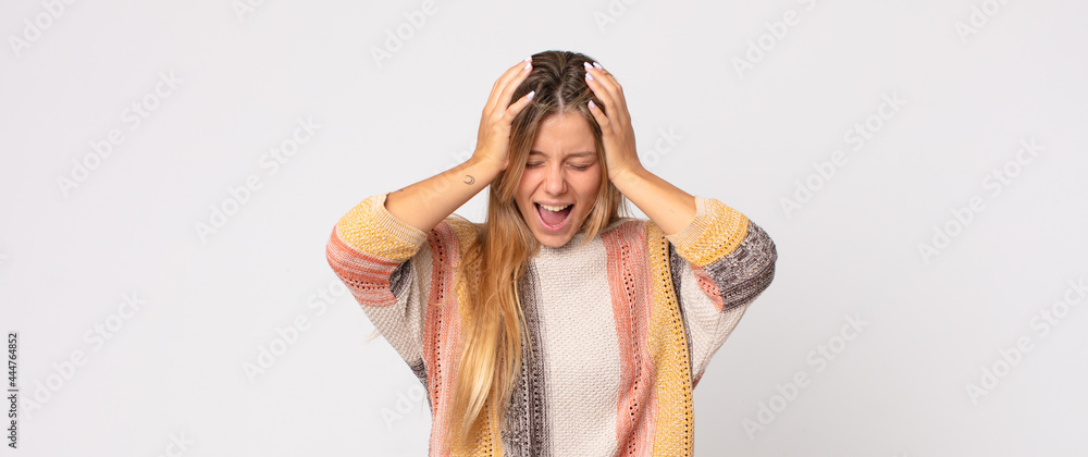 blonde pretty woman feeling stressed, frustrated and tired, rubbing ...