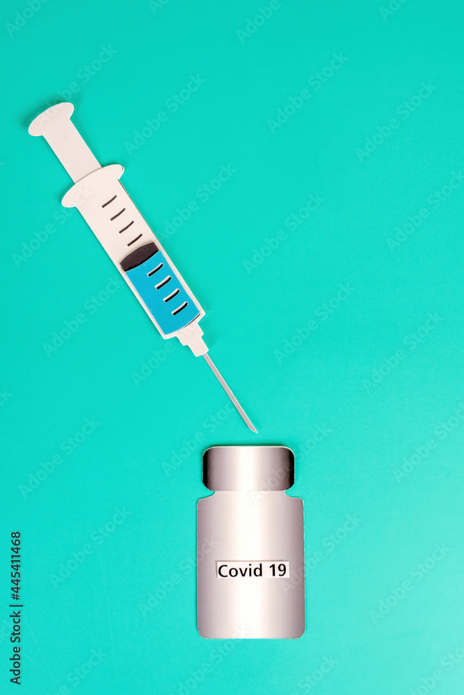 2D paper cutouts of filled syringe and bottle of vaccine Stock Photo ...