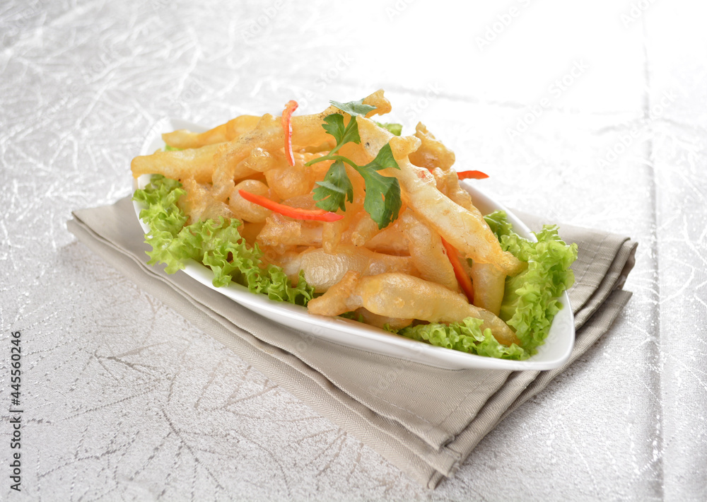 Deep fried crispy mini silver fish seafood snack with vegetables in ...