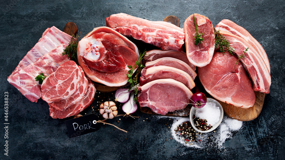 Different types of raw meat on black background Stock Photo | Adobe Stock