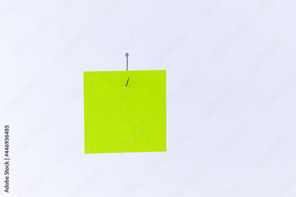 Mockup of a Blank Green Memo Paper with Copy Space Hanging on a Fishing ...