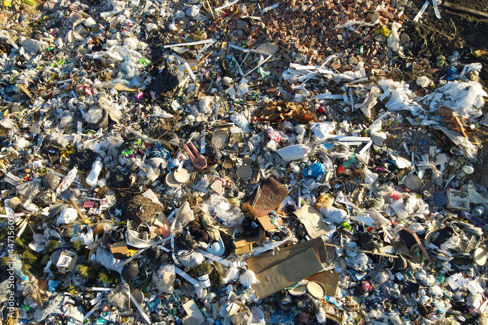 Garbage dump with plastic bags and food waste. Recycling of waste on ...