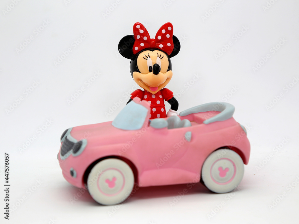 Minnie Mouse and her pink car. Toy. Cartoon character from Walt Disney ...
