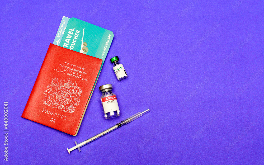 Flight boarding pass, red passport, visa beside world recommended covid ...