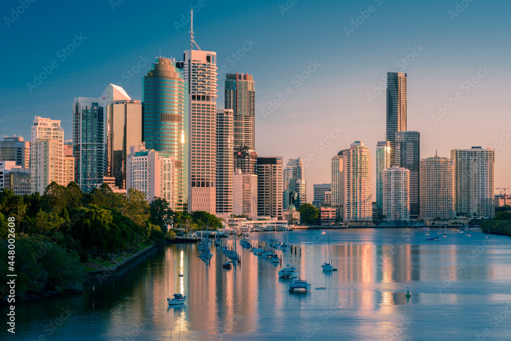 Brisbane city buildings and river seen in early morning light from ...