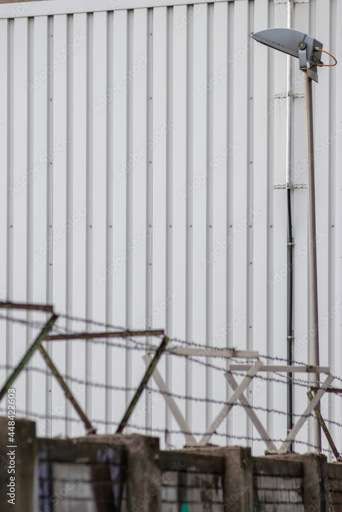 Barbed wire fence as protection and no trespassing safety symbol and ...
