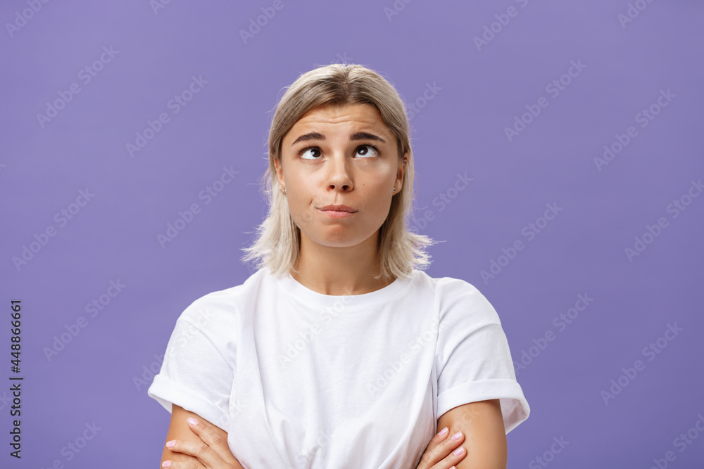 Mind going crazy. Portrait of funny tired attractive young woman with ...