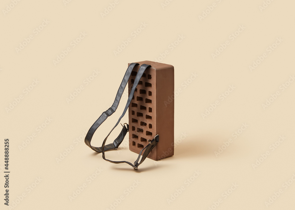 Brick in shape of backpack Stock Photo | Adobe Stock