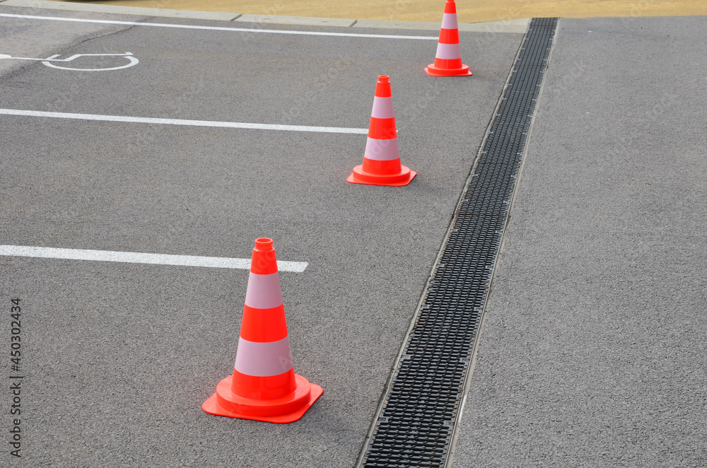 Traffic cones are a necessary aid, especially when repairing roads and ...