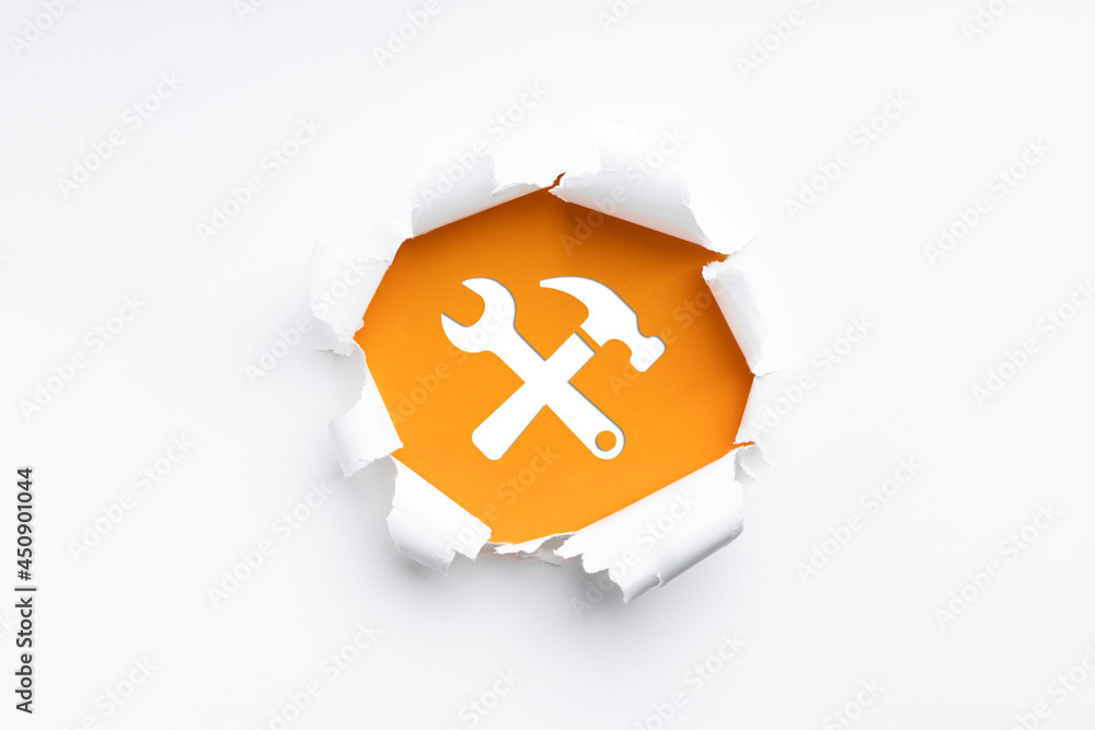 torn paper : under construction symbol Stock Photo | Adobe Stock