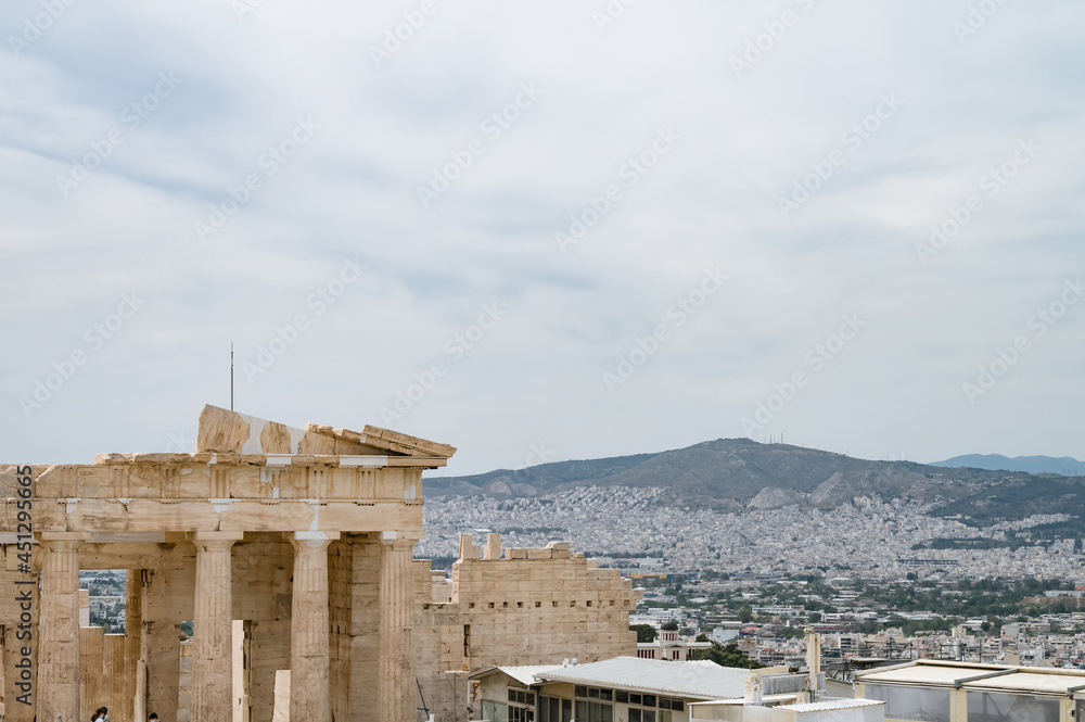 Cityscape of Athens from Acropolis hill. Ruins Temple of Athena Nike on ...