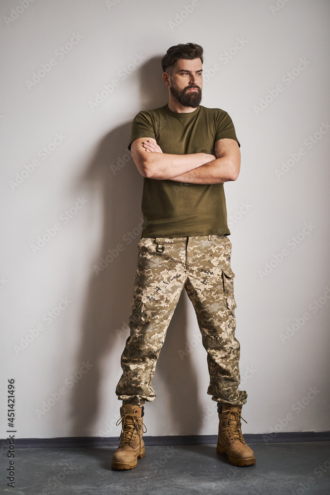 Full length portrait of a handsome and strong bearded soldier Stock ...