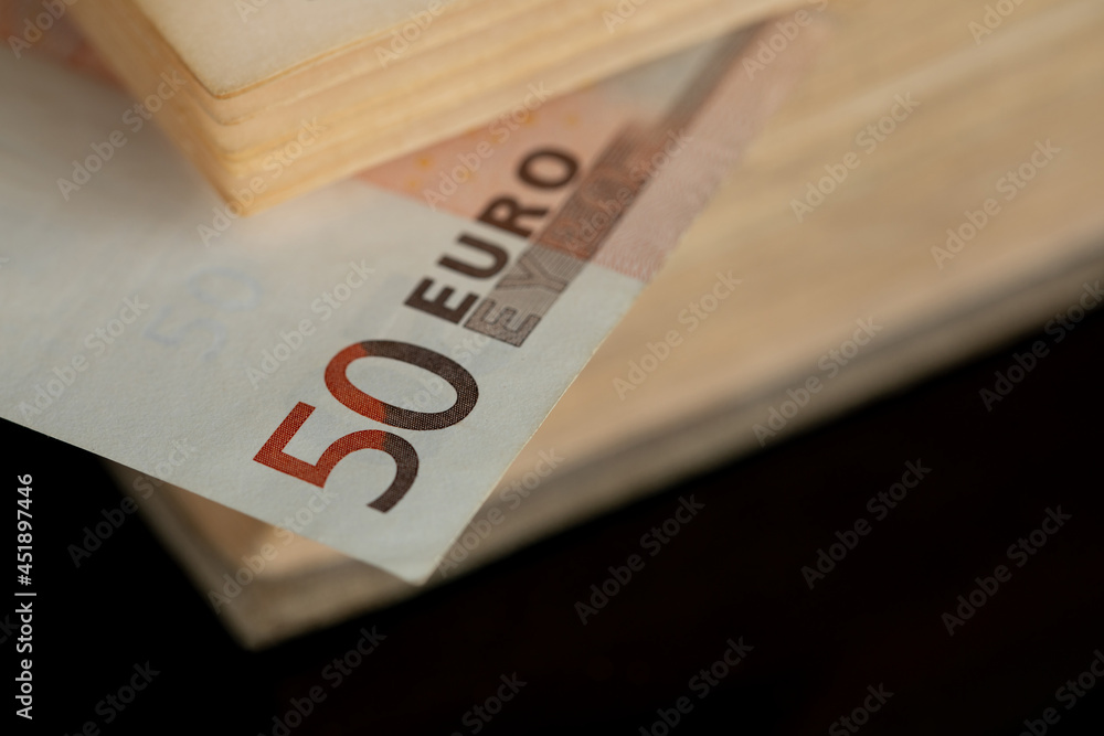 Fifty euro inside an old book. 50 Euro between the pages of old books ...