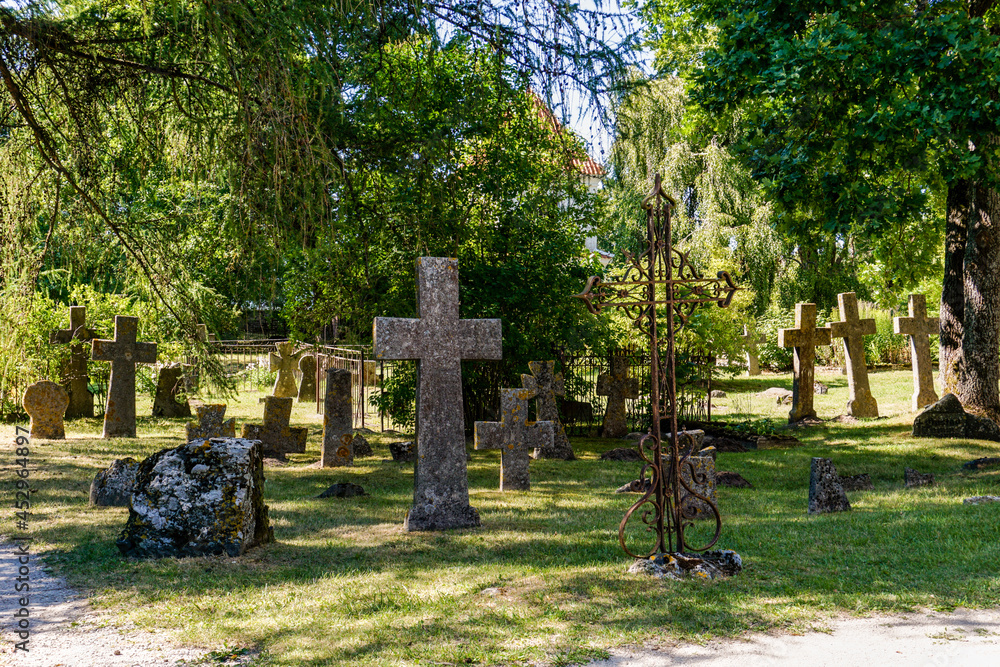 many headstones of different types in the cemetery at the Pirita ...