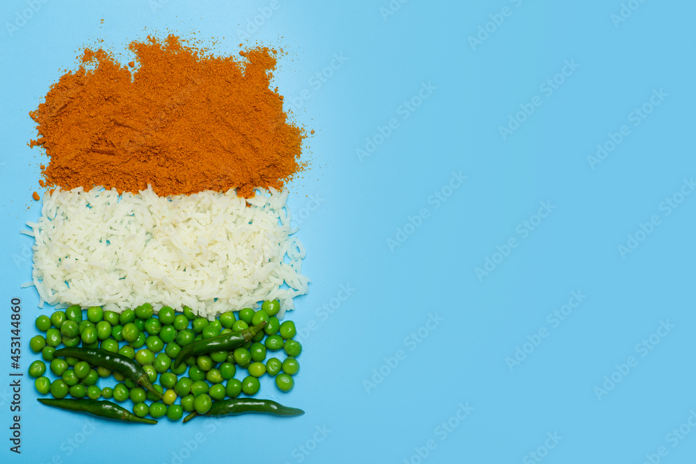 Indian flag made from food background. Basmati rice, curry, green peas ...