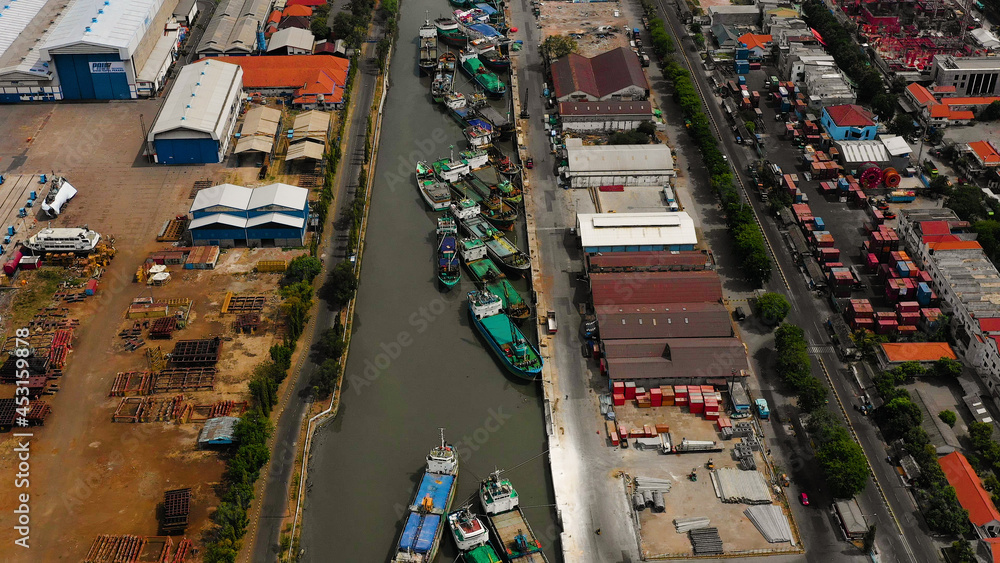 aerial view cargo and passenger seaport with ships and crane Tanjung ...