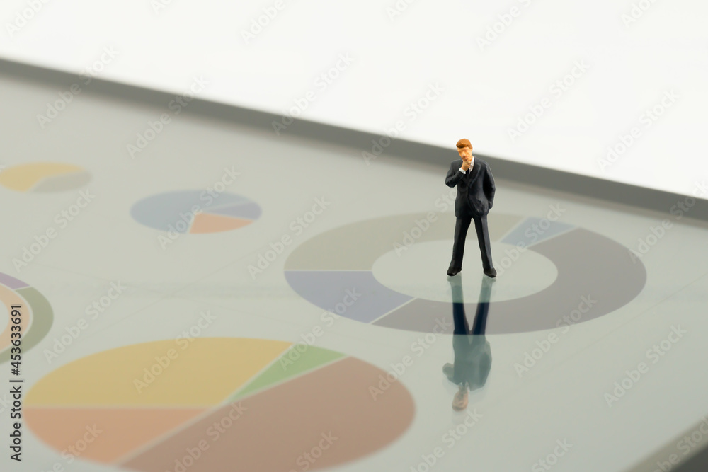 Miniature people Group Business man mini figures standing thinking on ...