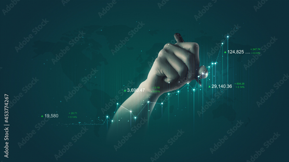 Business man holding financial pen chart and writing finance market ...