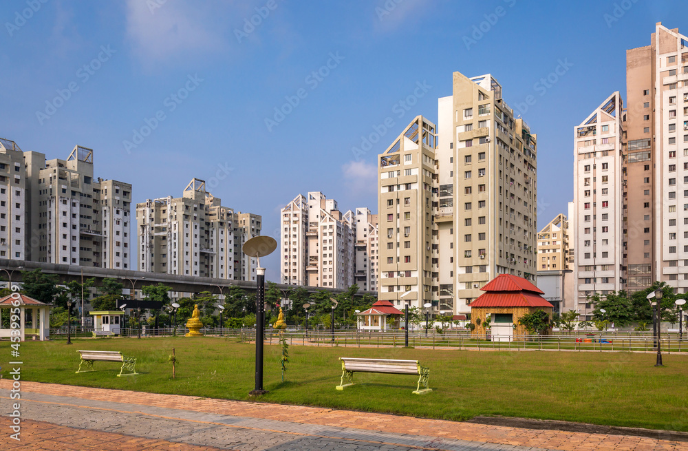 City road with high rise residential apartment buildings at Kolkata ...