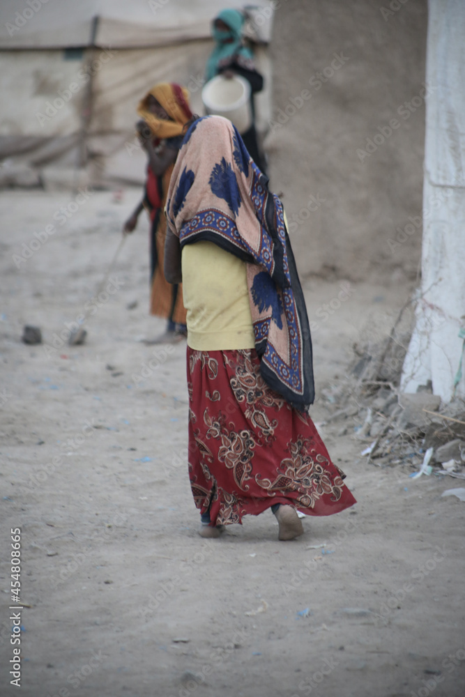 A Yemeni girl lives with her family in a camp for displaced people ...